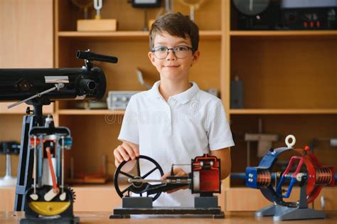 Physics Lesson A Student At A Desk With Scientific Instruments And A