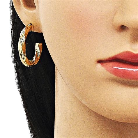 Oro Laminado Medium Hoop Gold Filled Style Twist And Hollow Design D