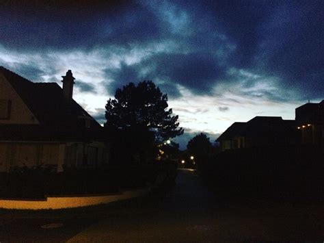 Premium Photo Buildings Against Cloudy Sky