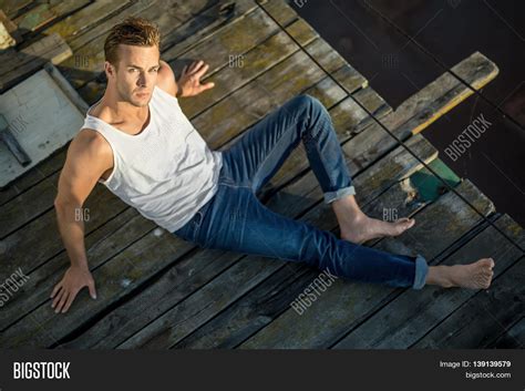 Cute Barefoot Guy Lies Image And Photo Free Trial Bigstock