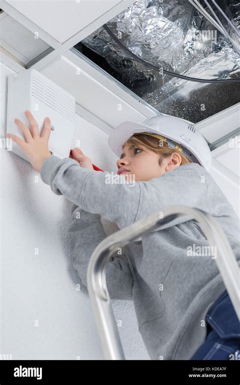 Woman Inside Home Cladding Hi Res Stock Photography And Images Alamy