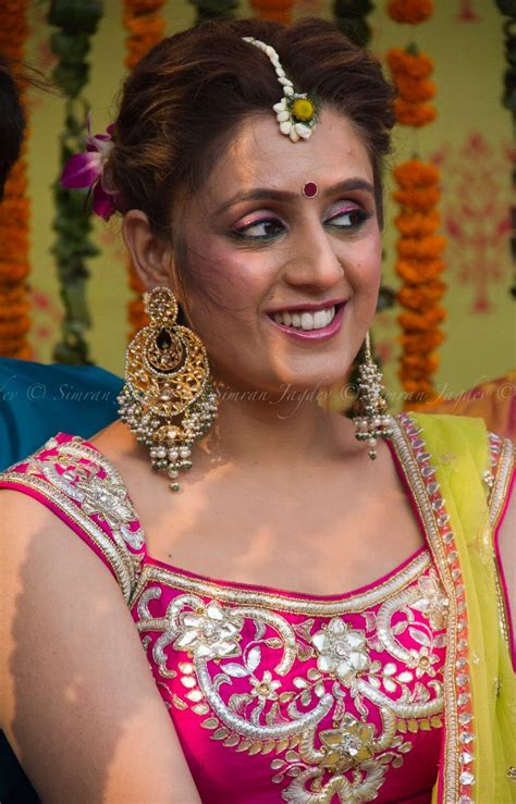 Orange And Pinkk Vibrant Mehendi By Simran Jagdev