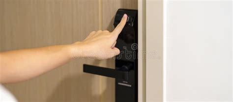 Hand Using Fingerprint Scan For Smart Digital Door Lock While Open Or Close The Door At Home Or