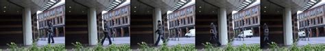 A Man Walking Into A Building A Covariance Tracker B Download