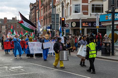 Street Protest With Flags And Drums In Urban Setting Editorial Image