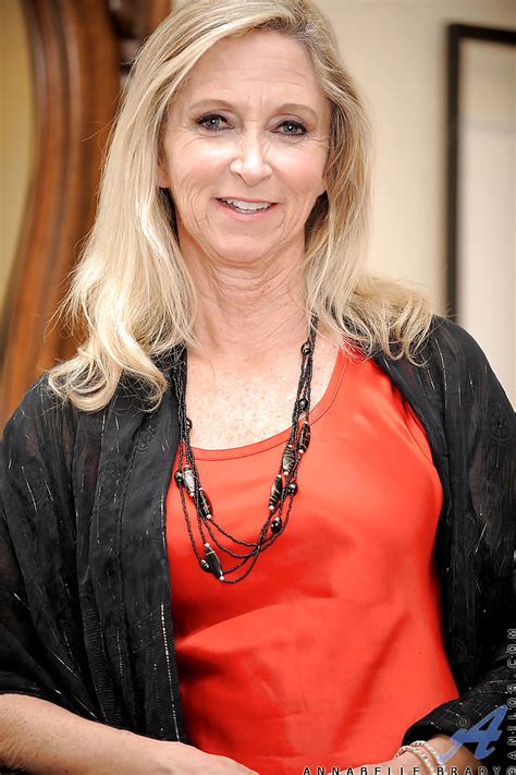 Plump Mature Annabelle Brady Posing In Nylon Pantyhose And Blowing