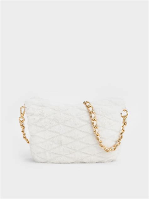 White Duo Furry Quilted Crescent Bag Charles And Keith International