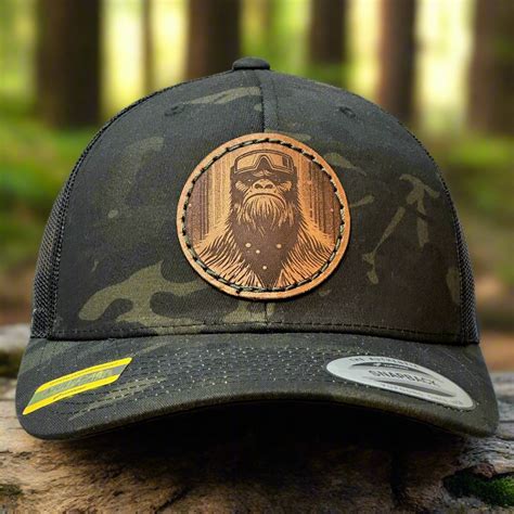 Snowy Bigfoot Leather Patch Black Camo Trucker Hat The Last Best Store