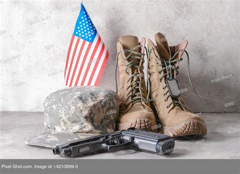 Army Boots Gun And Helmet