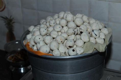 Premium Photo Neer Kozhukkatta Indian Home Made Neer Kozhukattai With Steamed Rice And