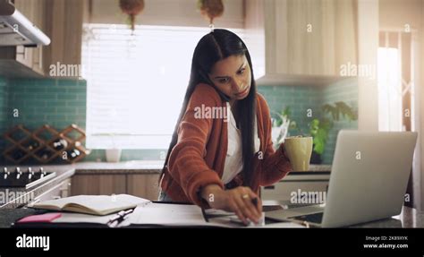 I Cant Function Properly Without Some Coffee A Young Businesswoman Taking A Phone Call While