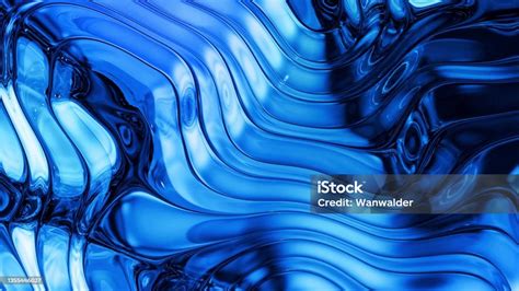 반짝이는 광택 표면에 물결 모양의 반짝이는 패턴이 있는 추상적인 액체 배경 호일 또는 화려한 유리의 표면과 같은 점성 파란색 유체 아름다운 창조적 인 축제 배경 심플한 밝은
