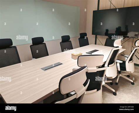 Empty Small Meeting Room With Television And White Board For Discussion Modern Minimalist