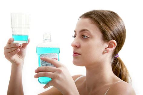 Teenage Girl With Mouthwash Photograph By Lea Paterson Fine Art America