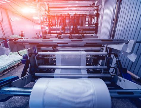 Modern Automated Production Line In Factory Plastic Bag Manufacturing Process Stock Image