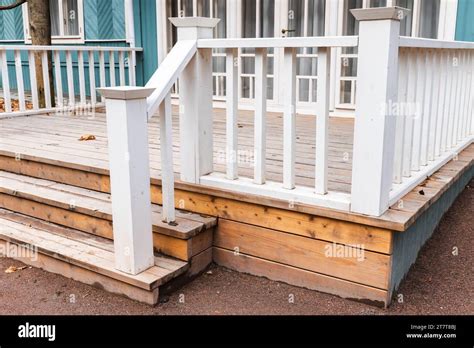Backyard Background Photo With An Empty Wooden Porch And Stairs With
