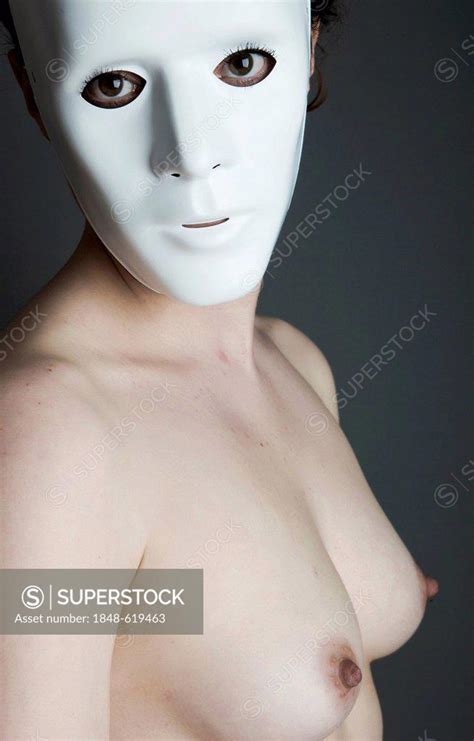 Woman Naked Wearing White Anonymous Mask SuperStock