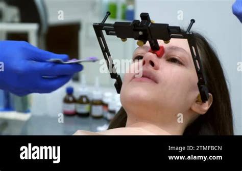 Orthodontist Installs Dental Facebow On Woman Face Prosthetics Orthodontic Treatment In