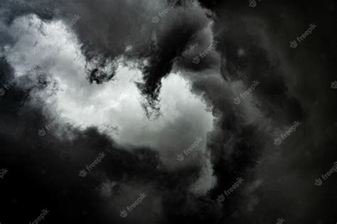 Premium Photo Dark God Face In Storm Cloud Formation With Eye Of