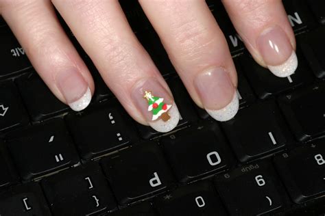 11 Holiday Themed Manicures Youll Want To Try Right Now