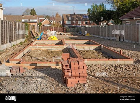 new detached house substructure construction progress red bricks