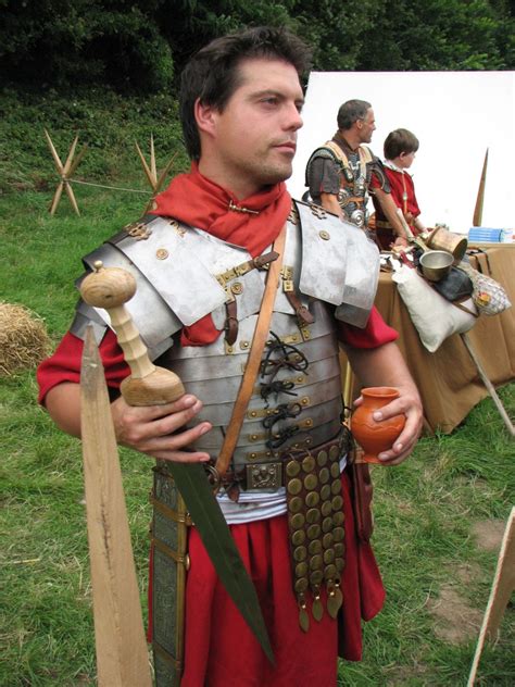 Roman Legionnaire In His Lorica Segmentata Armor Showing His Gladius