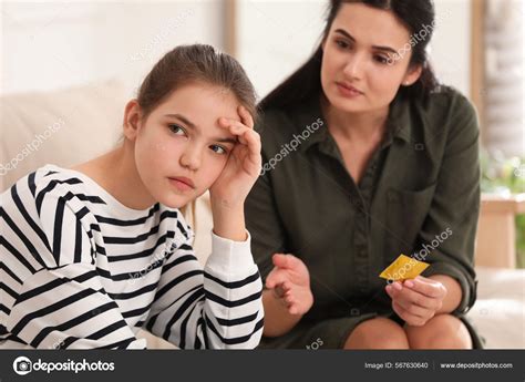 Mother Giving Condom Her Teenage Daughter Home Sex Education Concept