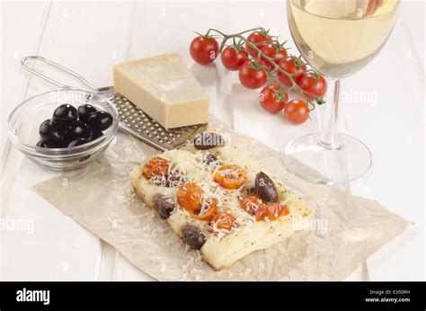 Mediterranean Flat Bread With Cherry Tomato Olive And Grated Mozarella