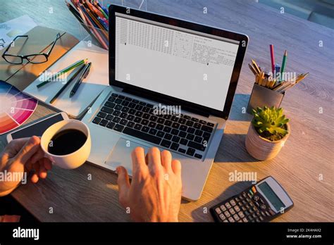 Hands Of Caucasian Male Programmer Sitting At Desk And Using Laptop