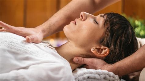 Premium Photo Traditional Thai Passive Neck Stretching Massage