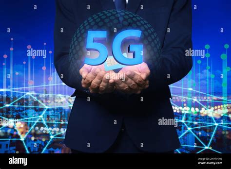 Man Demonstrating 5g Sim Card Model And Cityscape With Connection Lines