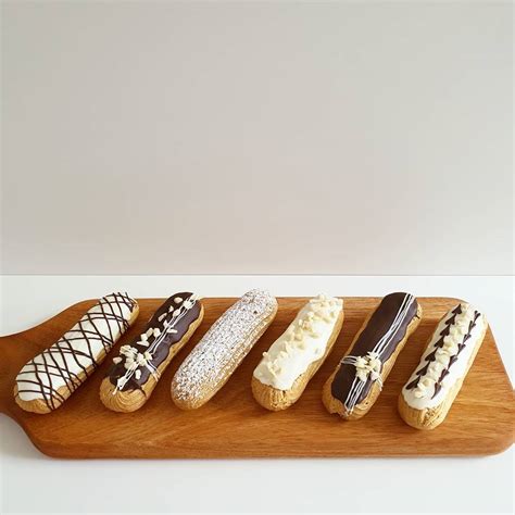 Assorted Donuts On A Wooden Tray
