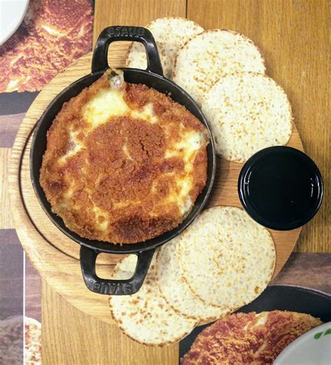 Zaatar W Zeit Goes Back to Basics With Knefeh in the Pan