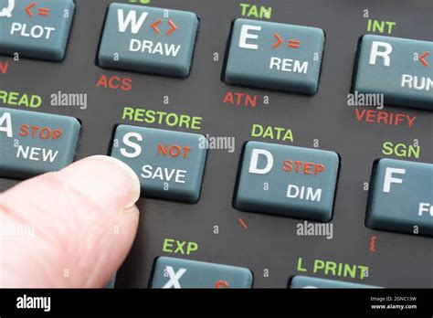 sinclair zx spectrum keyboard close up focus on basic save program