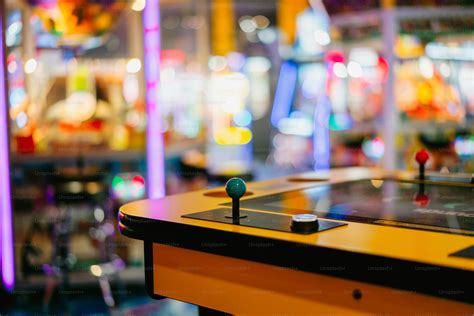 Arcade Game Controls Are Ready For Gameplay Photo Gaming Image On Unsplash