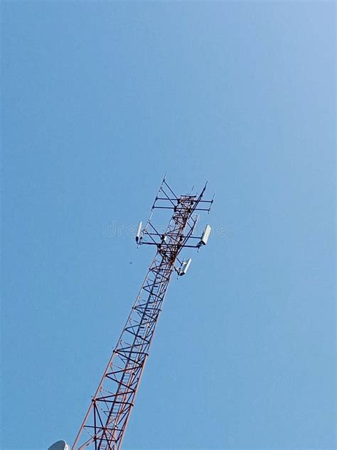 A Cellular Tower Against A Blue Sky Background Stock Image Image Of Background Tower 285402071