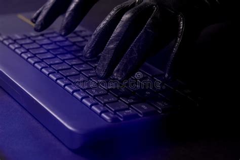 Hacking System Cybercriminal Behind A Laptop Digital Binary Code In