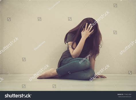 Girl Kneeling And Crying