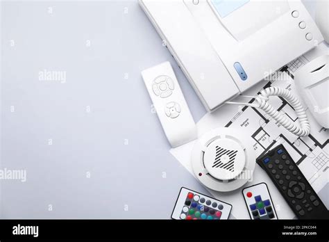 Remote Controls Intercom Building Plan Smoke And Movement Detectors On White Background Flat