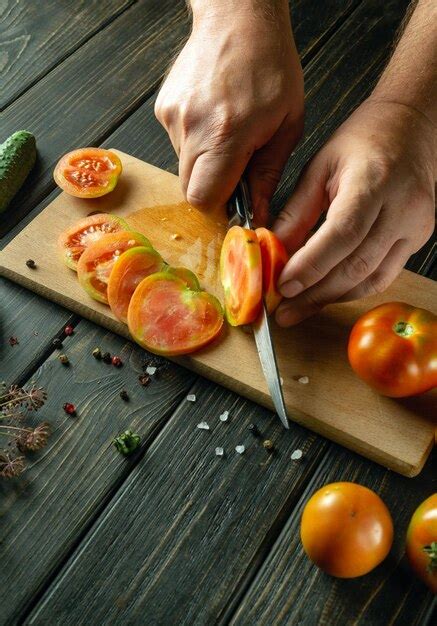 Premium Photo Cooking Vegetable Dishes On The Kitchen Table The Cook