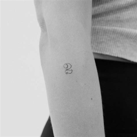Number 2 Tattoo Located On The Forearm