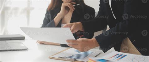 Business Professionals Group Of Young Confident Business People Analyzing Data Using Computer