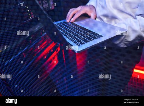 Busy Maintenance Administrator Controlling Operational Server Rack