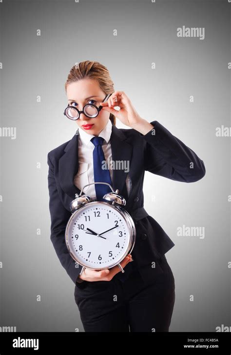 Nerd Businesswoman With Giant Alarm Clock Stock Photo Alamy