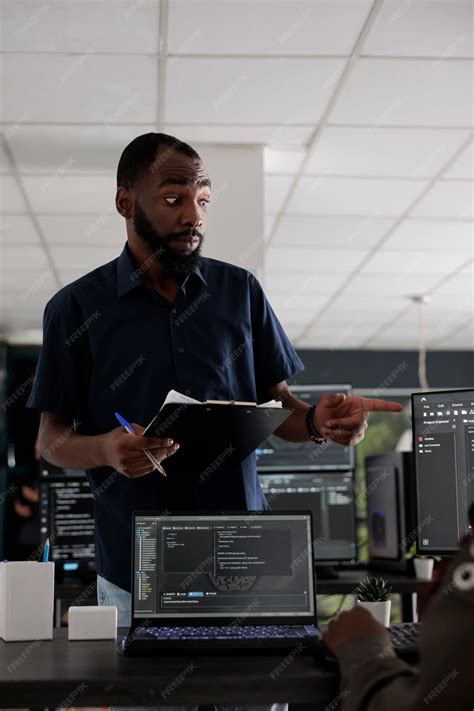 Premium Photo African American Web Developer Analyzing Html Script On