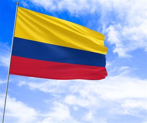 Premium Photo Colombia National Flag Waving On Blue Background