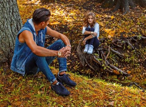 Man Sitting Under Tree And Looking At His Girlfriend Stock Image Image Of Leaf Husband