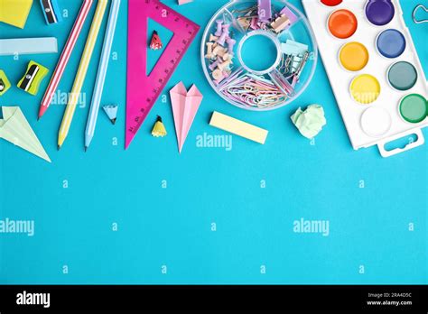 Different School Stationery Items On Light Blue Background Flat Lay