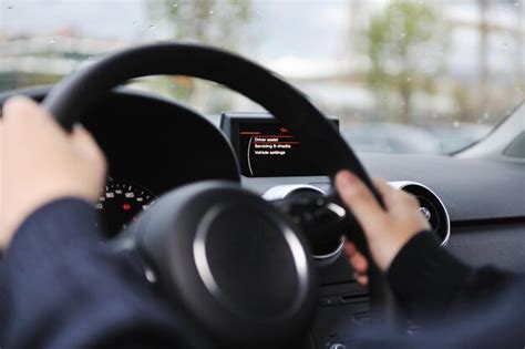 Premium Photo Young Man Using New Car Navigation And Onboard Vehicle