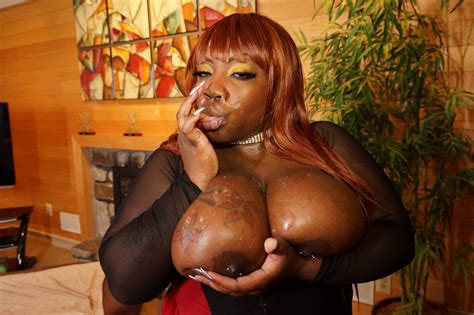 Bit Tittied Ebony Babe Sucks A Hard Cock Photos